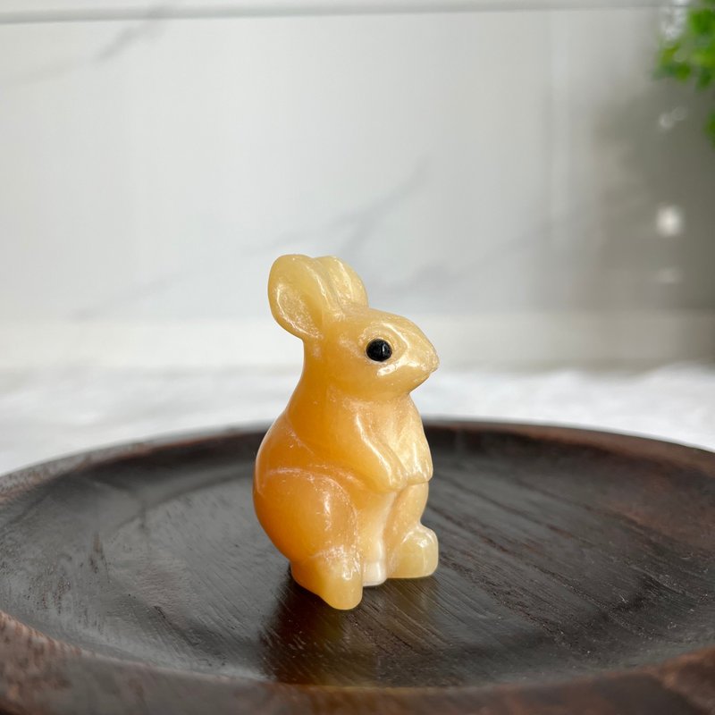 Lucky rabbit focuses your thoughts on wealth and fortune. Calcite ...